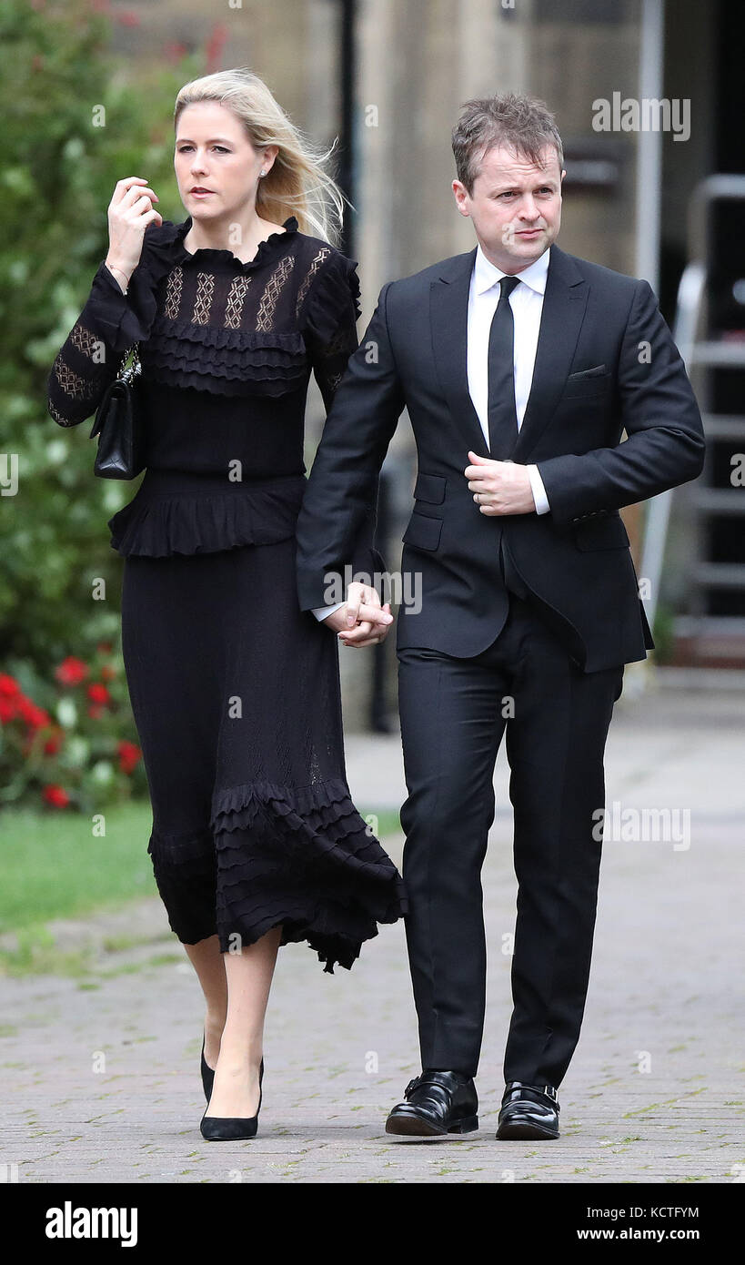 Declan Donnelly and his wife Ali Astall arrive for the funeral service ...