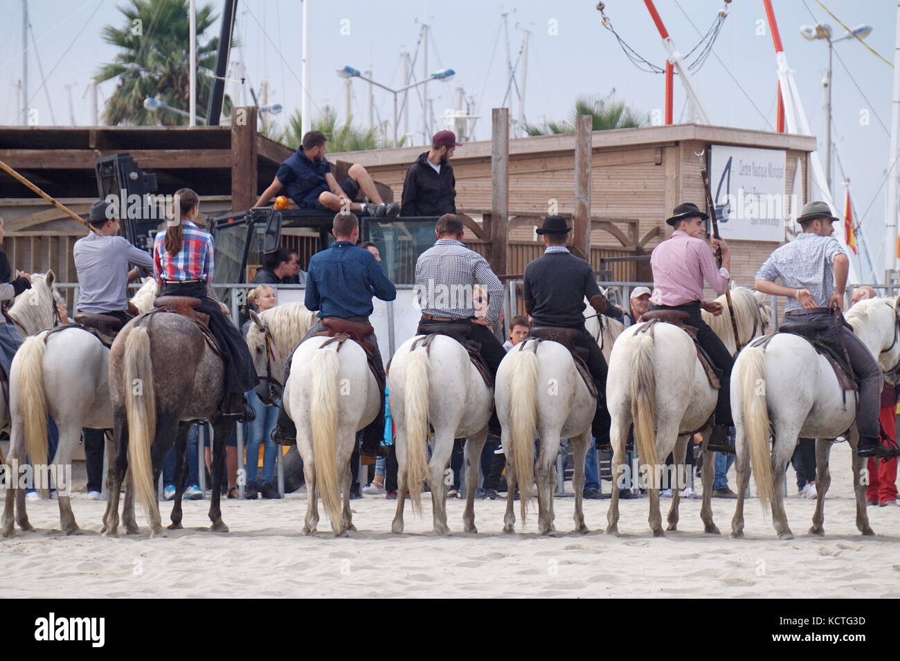 Riders line up before the running of the bulls on the beach at Palavas ...