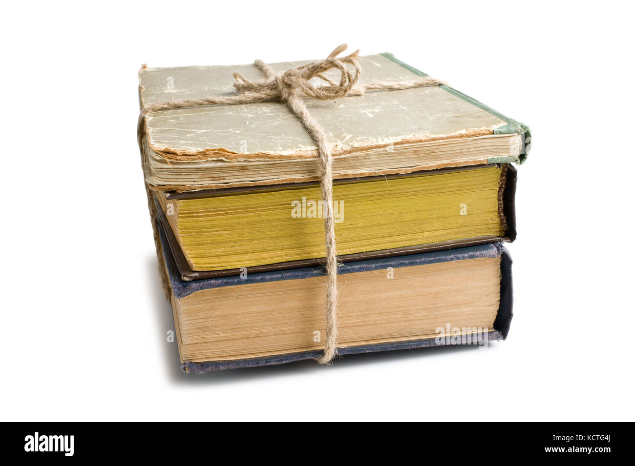 stack of old books tied with rope isolated on white Stock Photo - Alamy