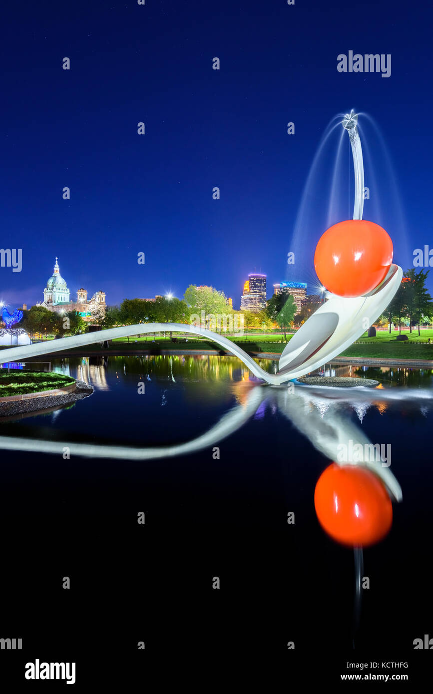 Spoonbridge and Cherry sculpture in front of Minneapolis skyline at ...