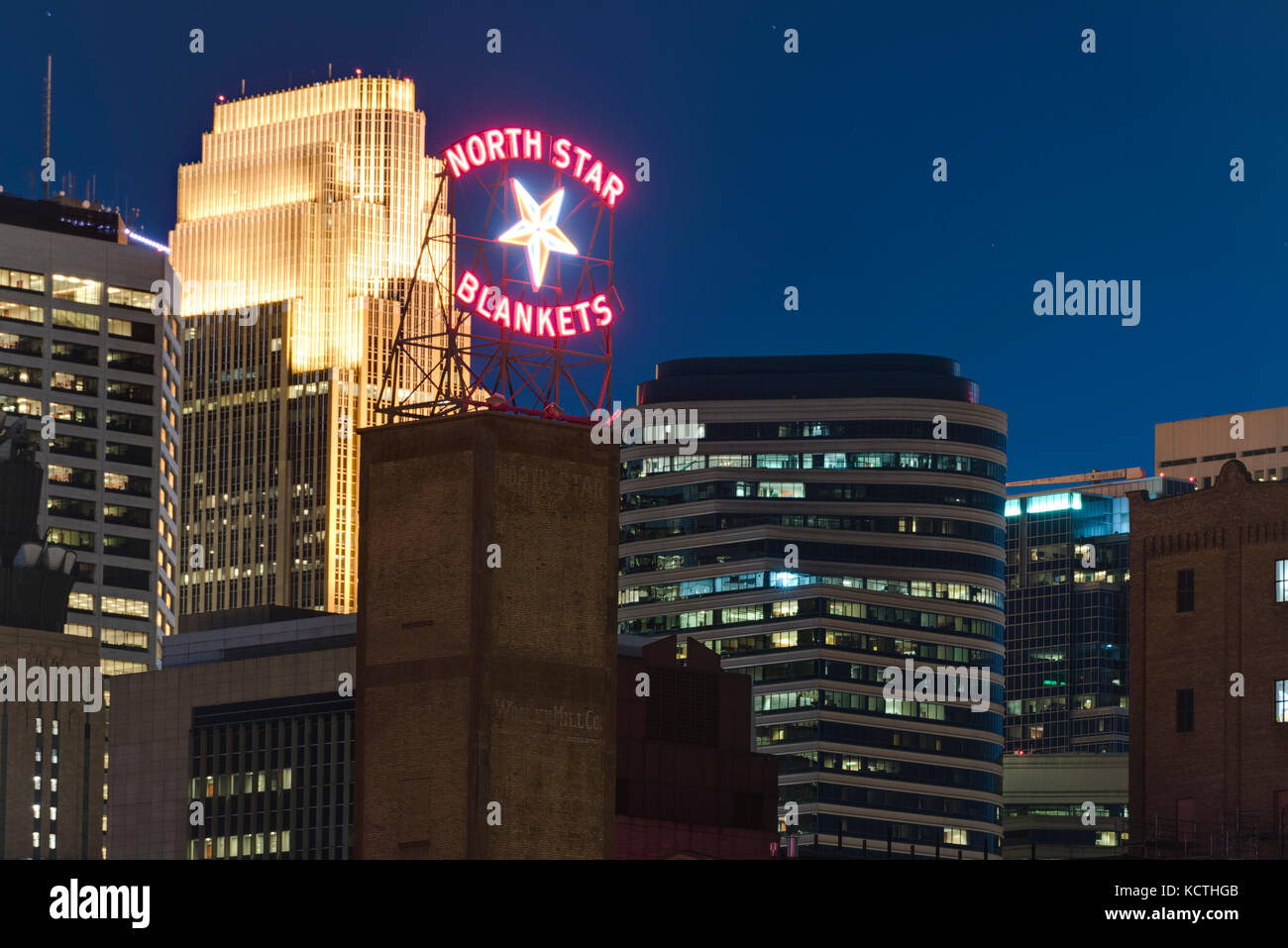 North Star Blankets sign against the Minneapolis skyline at night Stock ...