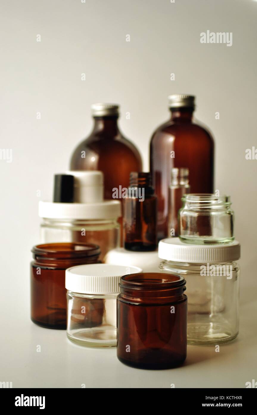 Clear and brown laboratory glass jars and bottles. Containers for ...