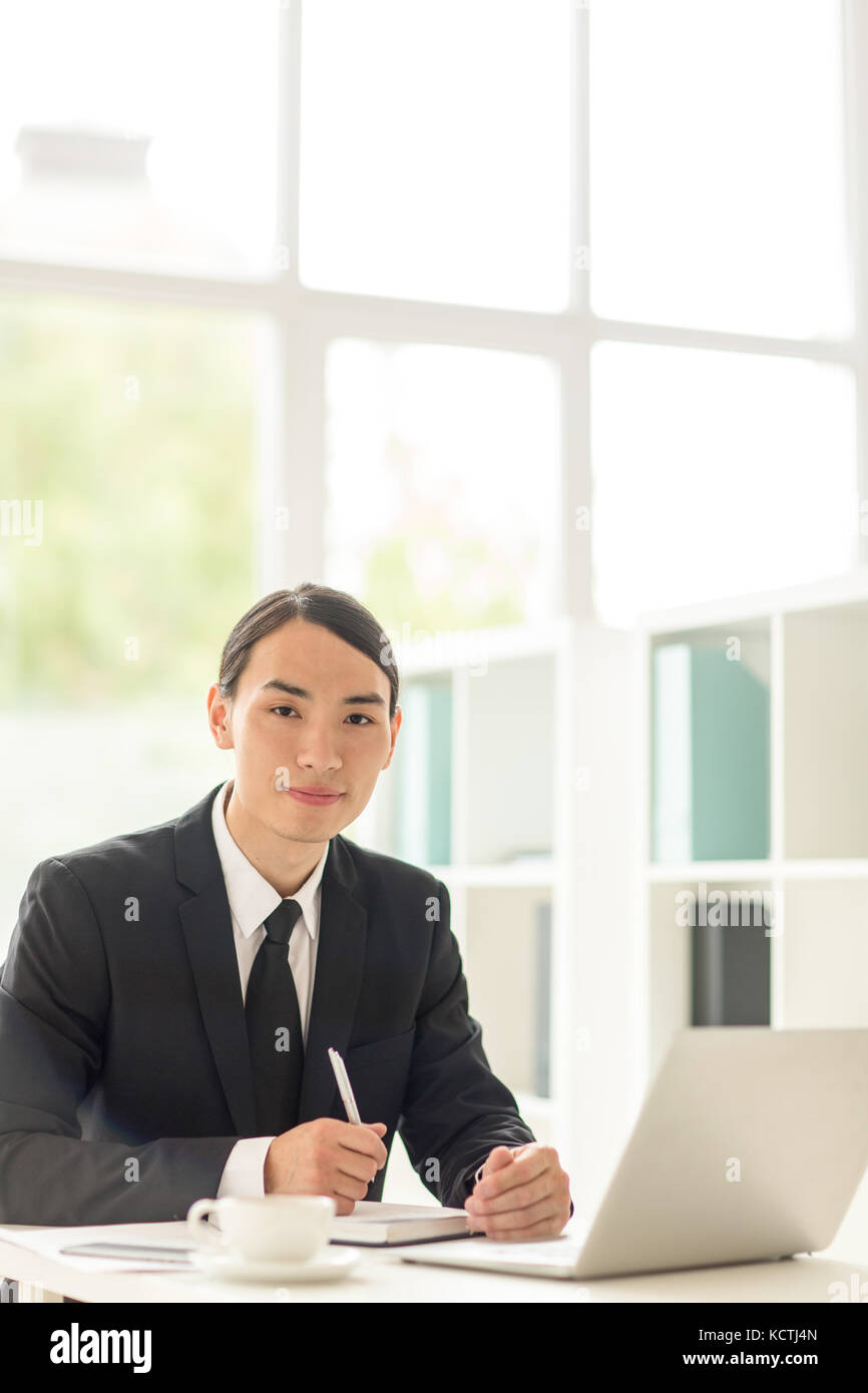 Young office manager Stock Photo - Alamy