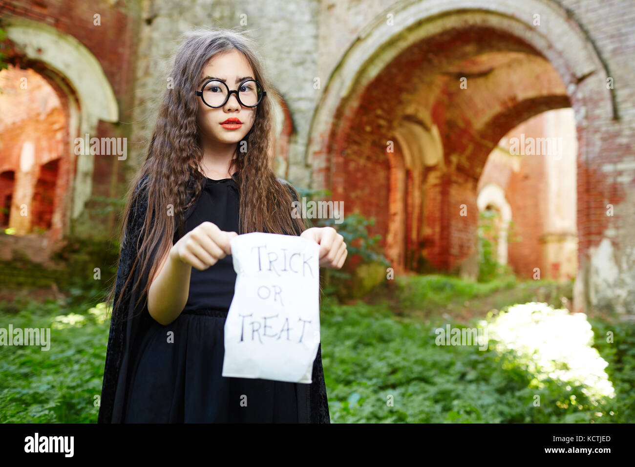 Girl with treats Stock Photo - Alamy