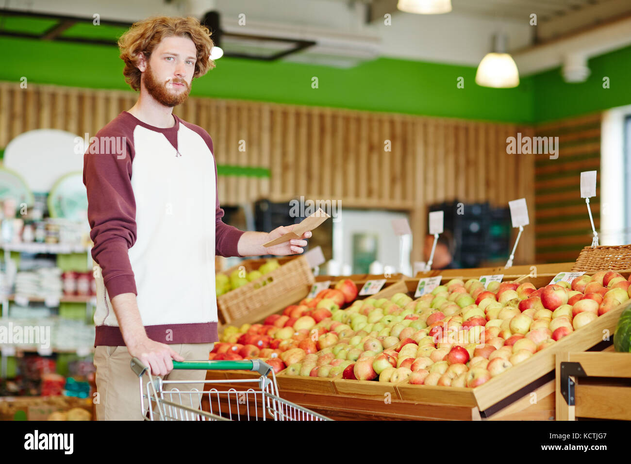 Man with shopping list Stock Photo - Alamy