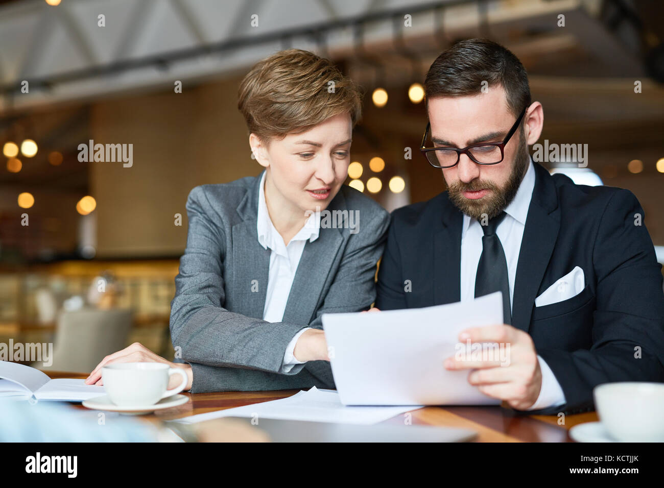 Discussing contract terms Stock Photo - Alamy