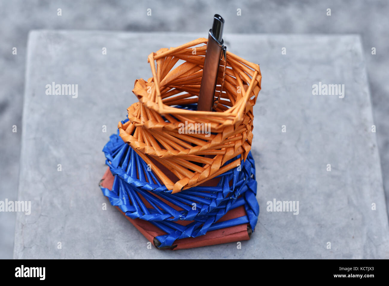 A beautiful pen holder made by paper Stock Photo - Alamy