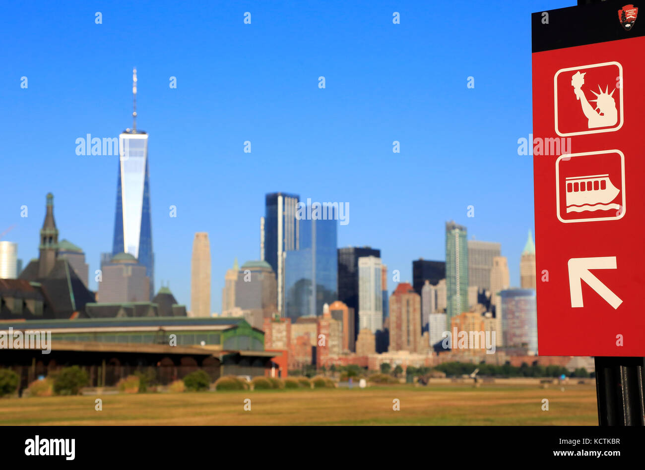 Direction sign for Statue of Liberty and Statue of Liberty Ferry in ...