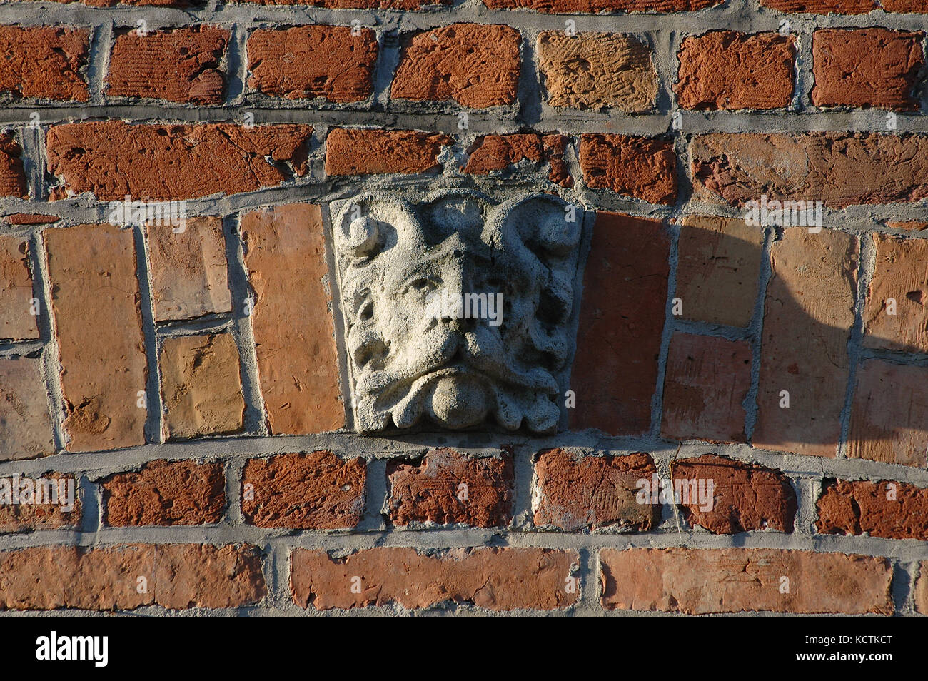 Ornate keystone in a brick window arch Stock Photo - Alamy