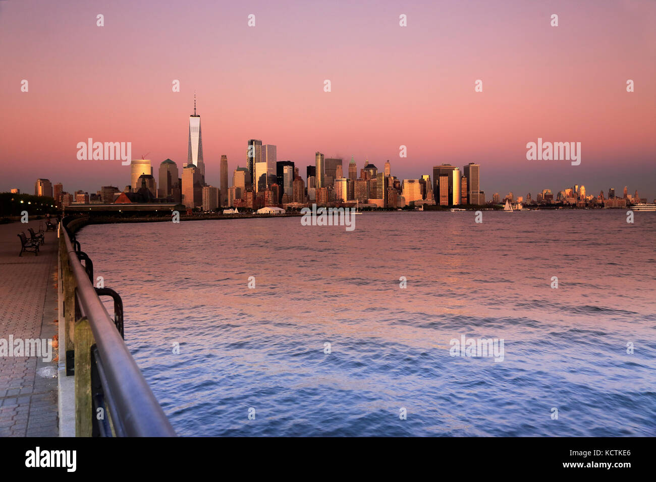 Sunset view of Lower Manhattan financial district with Hudson River in ...