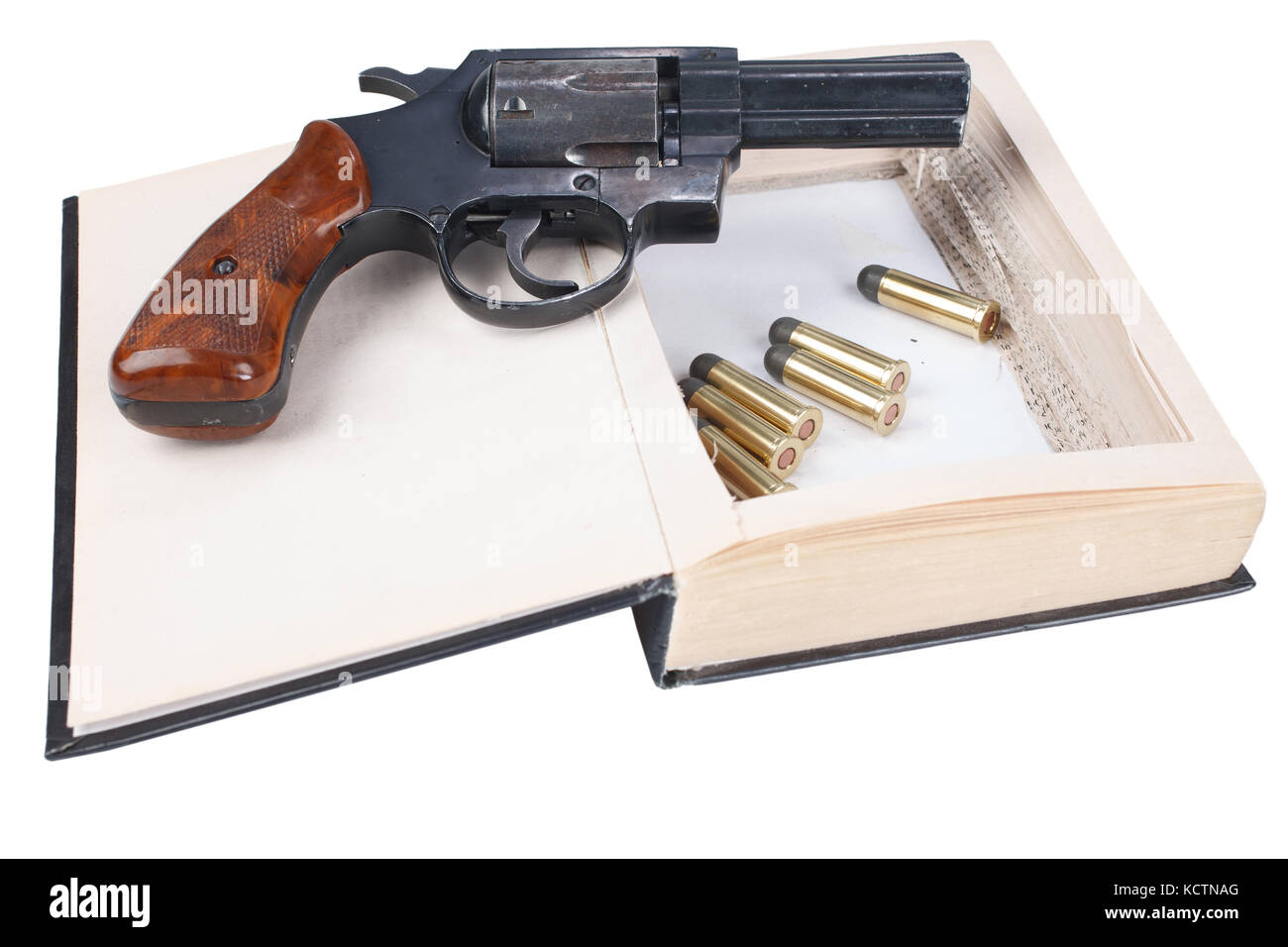 Gun hidden in book Cut Out Stock Images & Pictures - Alamy