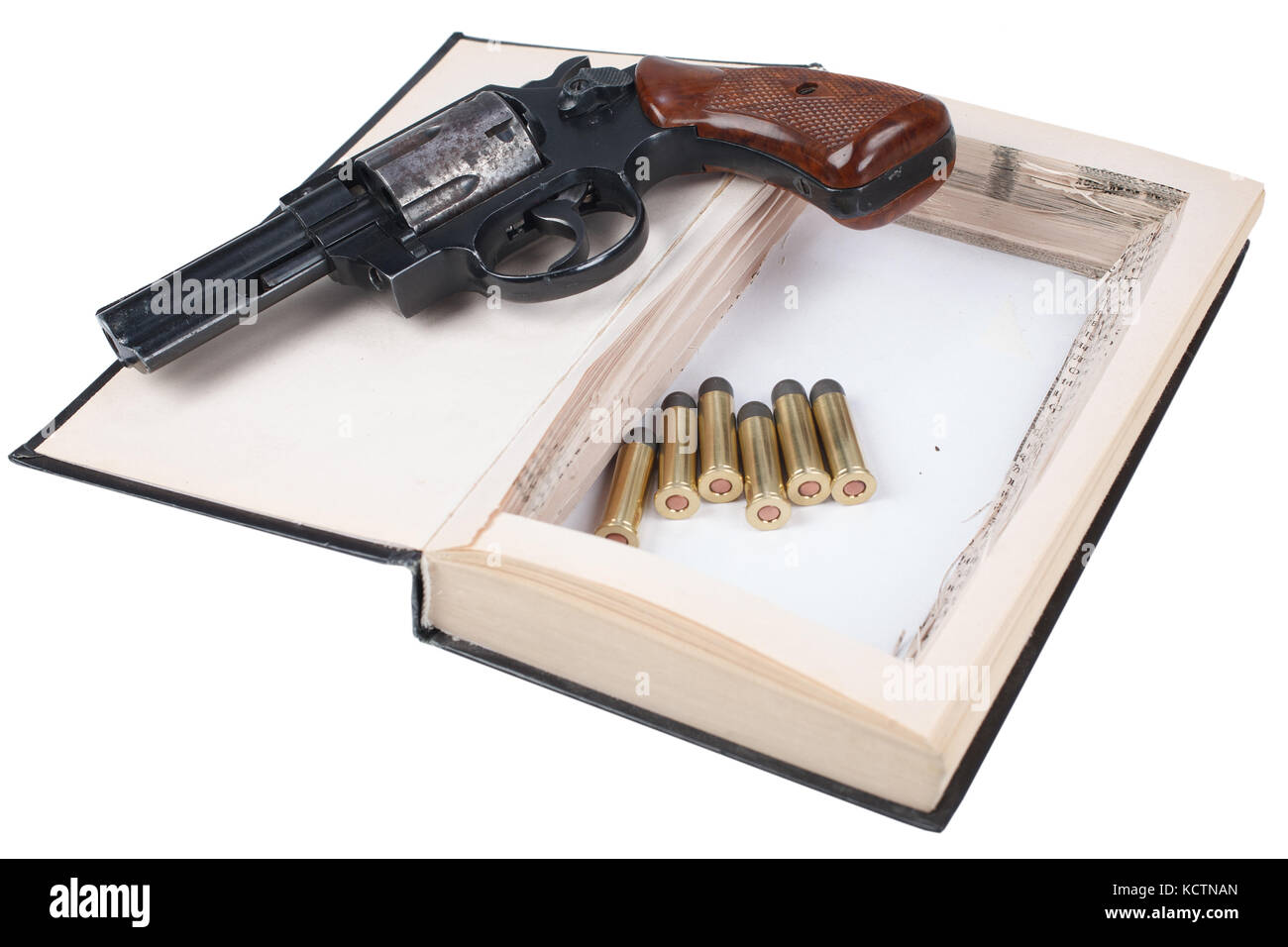 Gun hidden in book Cut Out Stock Images & Pictures - Alamy