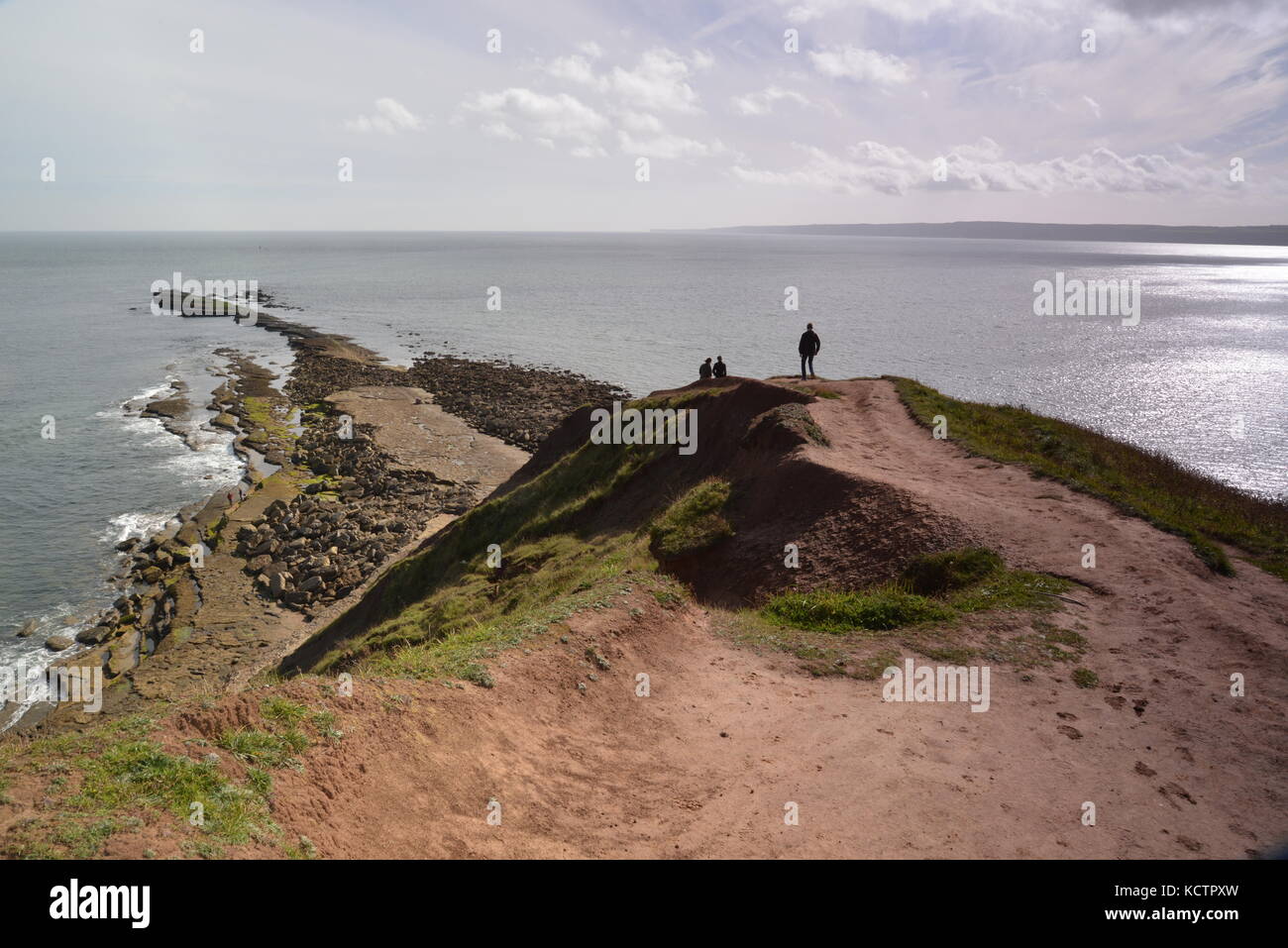 A walk on a sunny autumn day along the coastal path at Filey, North ...