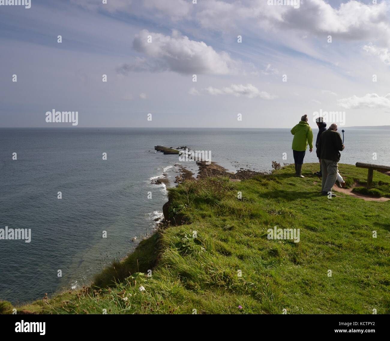 A walk on a sunny autumn day along the coastal path at Filey, North ...