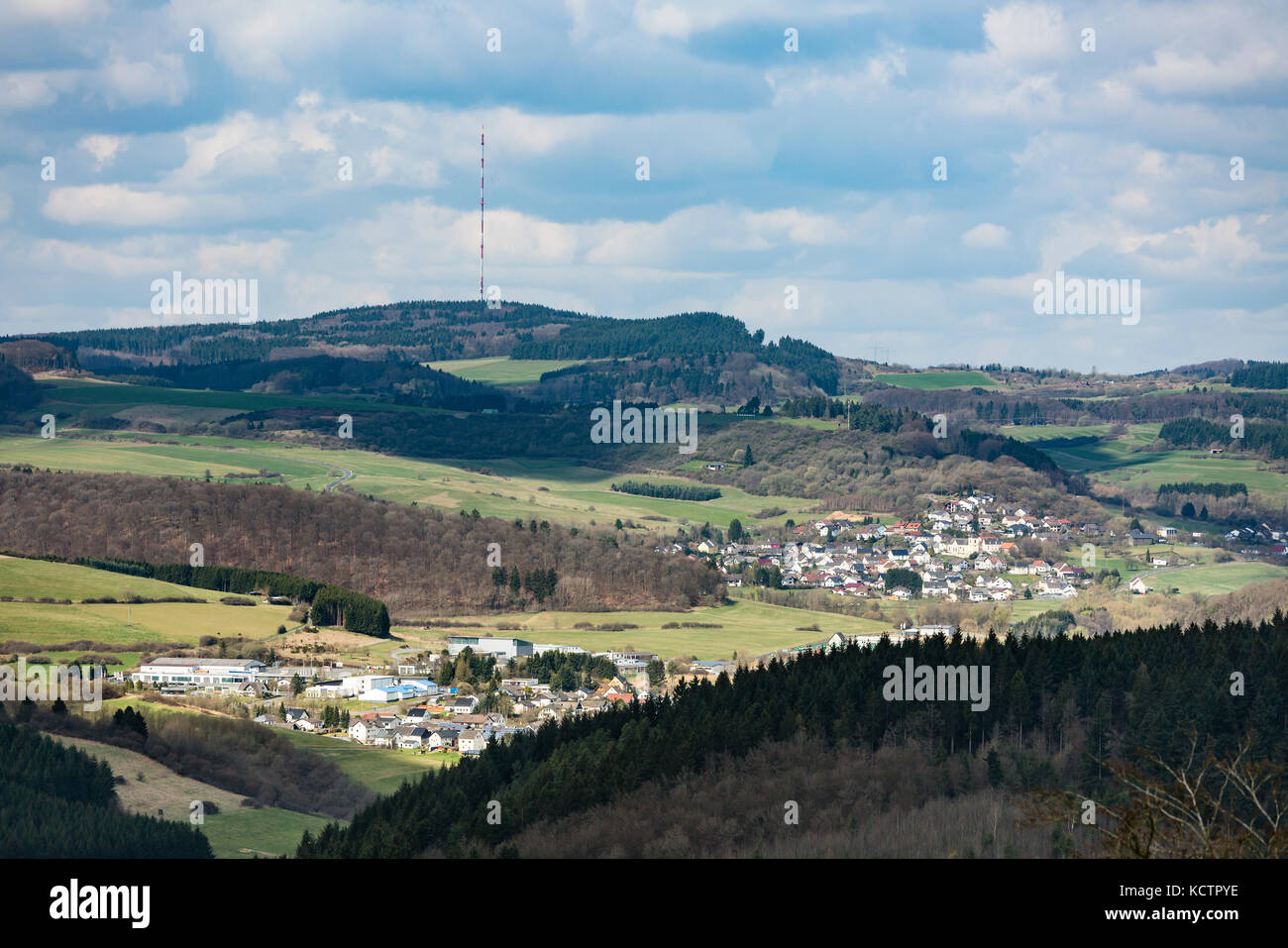 View over the southern Eifel hills to Daun, Germany with a tall ...