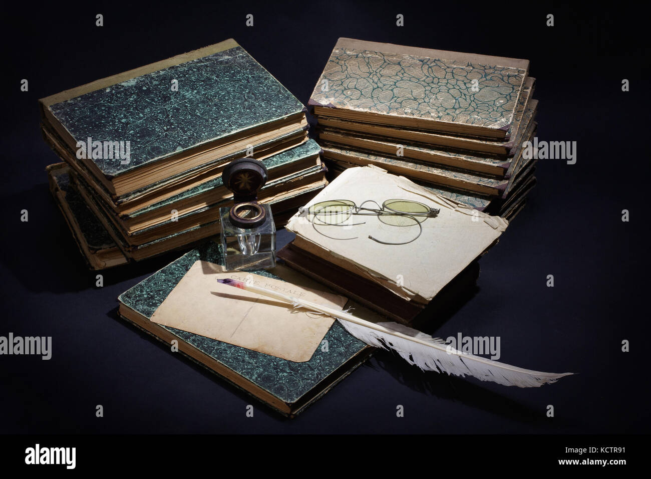 old books, papers, ink pen and inkpot on black background Stock Photo ...