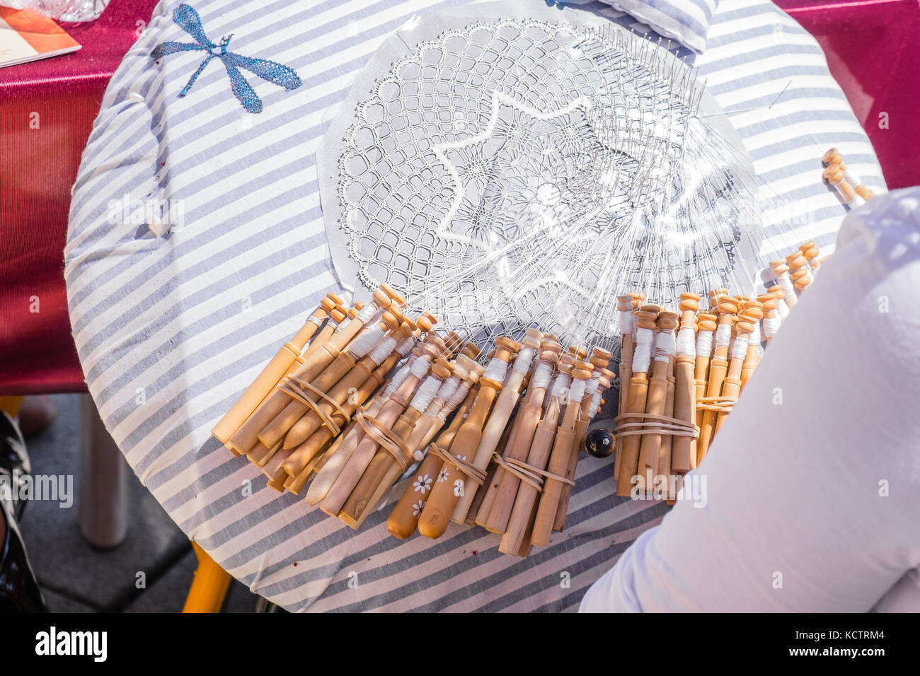 traditional bobbin lace work with wire and wood Stock Photo - Alamy
