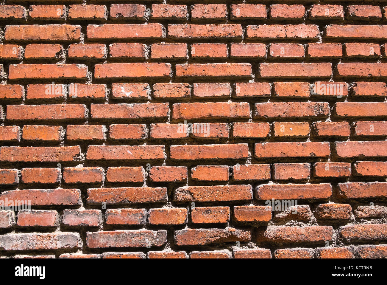 wall old and worn red brick house to use as background Stock Photo - Alamy