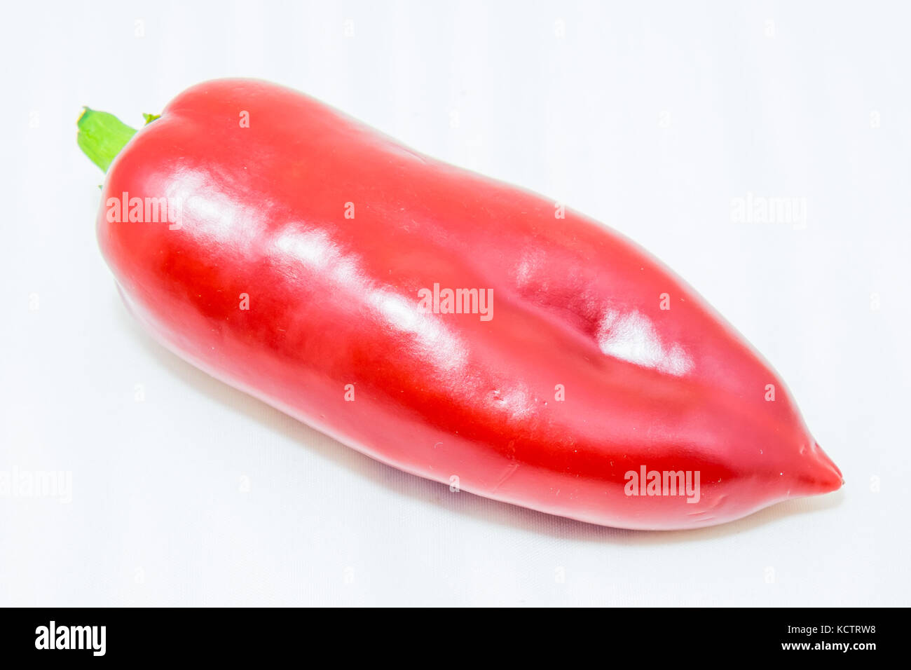 Fresh red pepper on a white background Stock Photo - Alamy