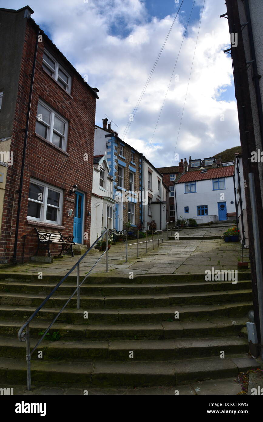 Stone steps leading towards street, Staithes, North Yorkshire UK Stock ...