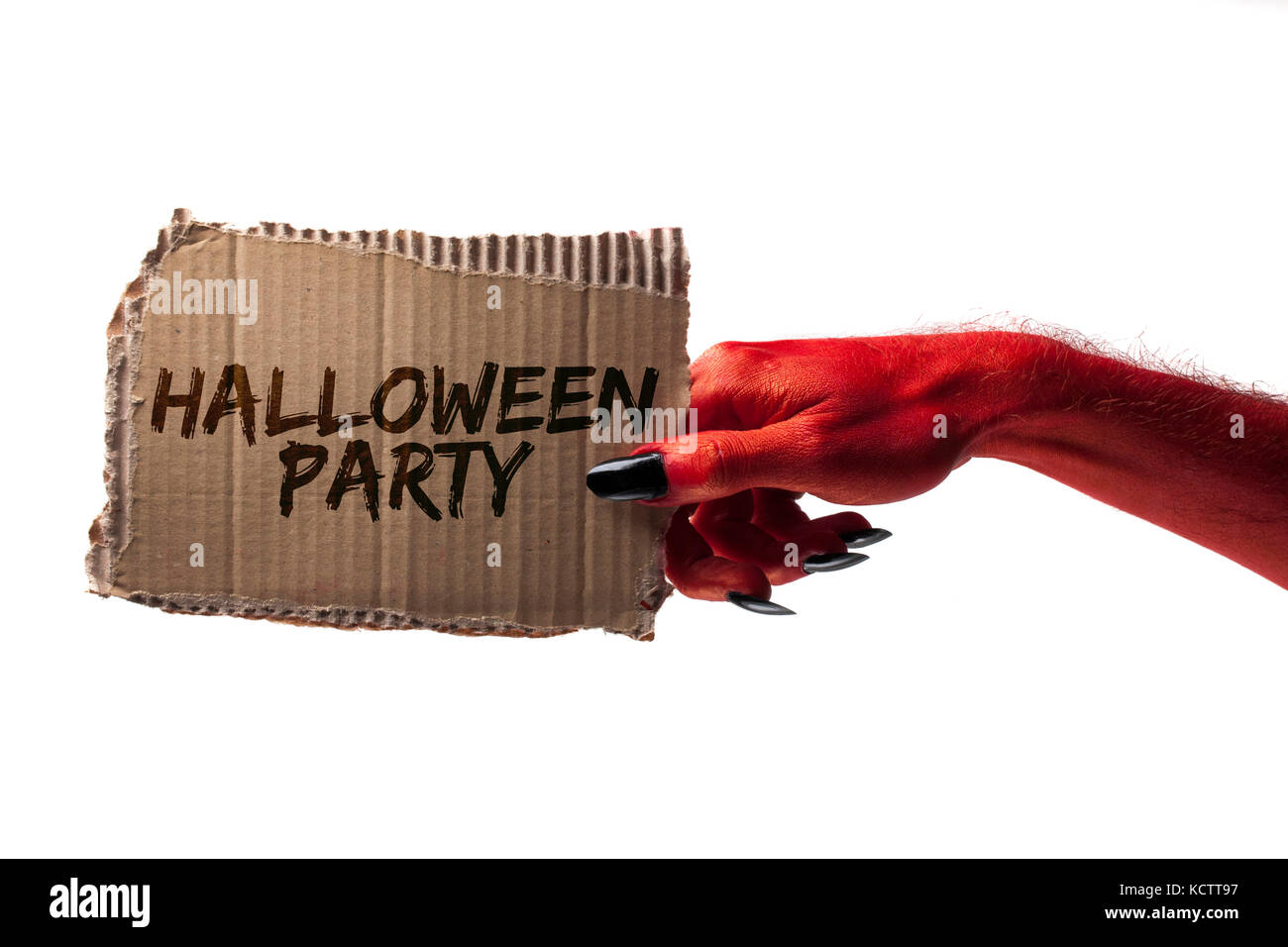 Halloween party. red devil or zombie monster hand holding a halloween ...