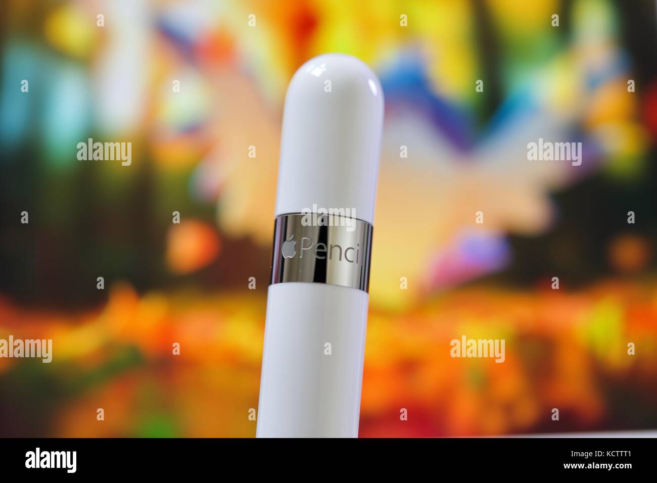 Apple Pencil with a colourful background Stock Photo - Alamy