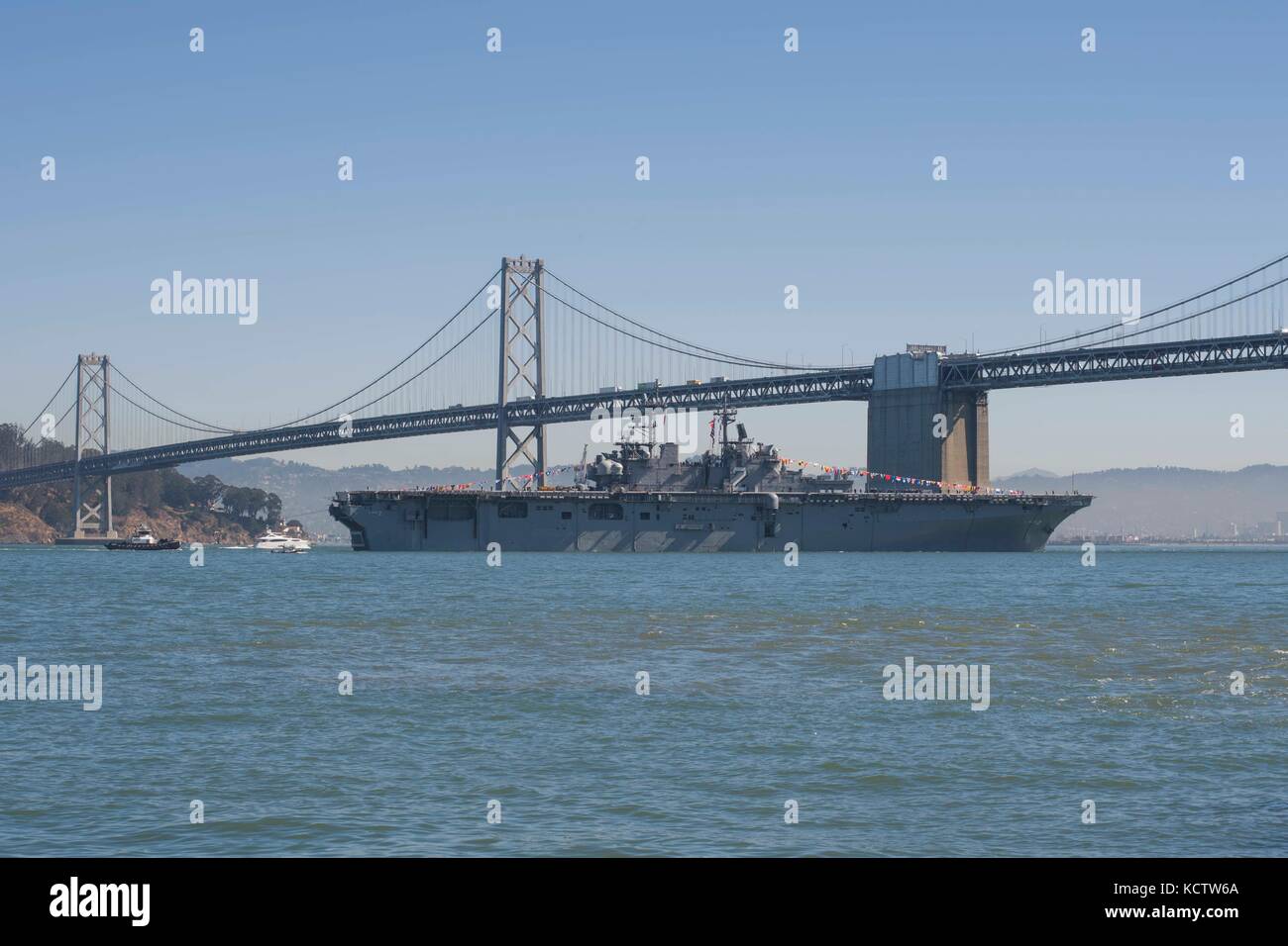 Wasp-class amphibious assault ship USS Essex (LHD 2) transits under the ...