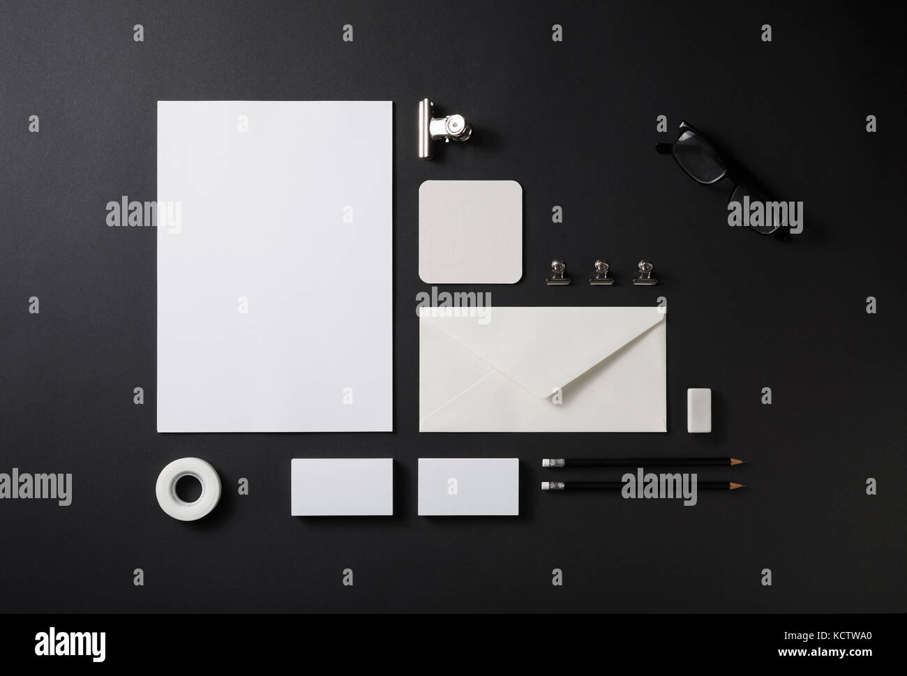 Blank stationery set on black paper background. Paperwork template ...