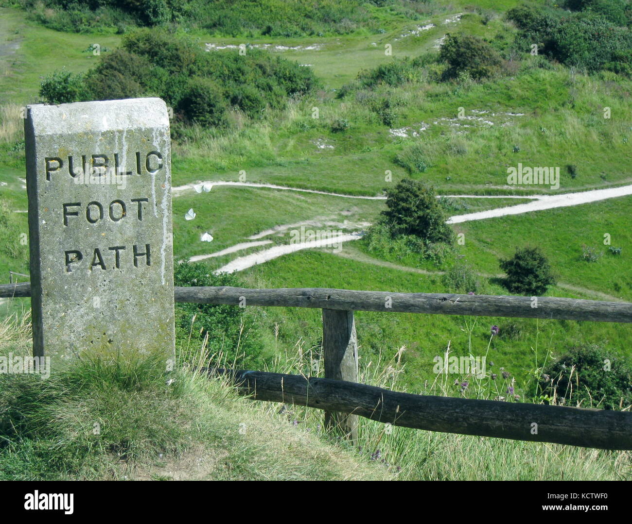 Stone public footpath marker sign in the countryside Stock Photo - Alamy