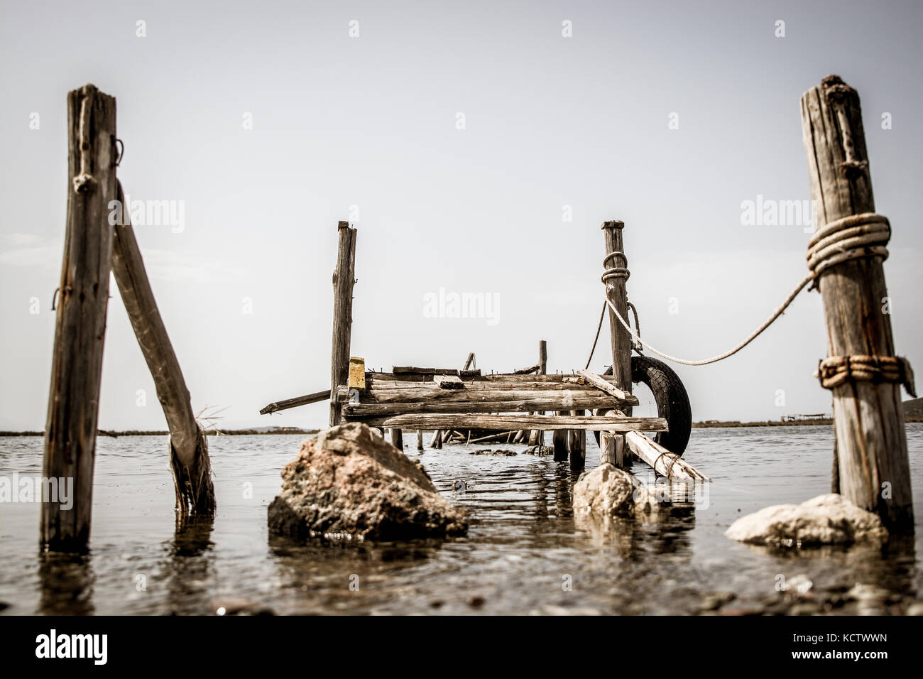 A small wooden dock for fishing boats at Acheloos river mooth Stock ...