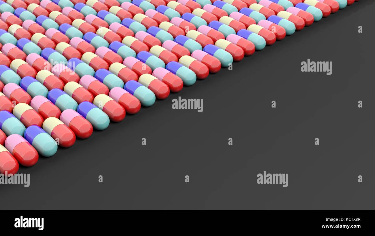 Colorful caplets with copy-space, isolated on black background Stock ...