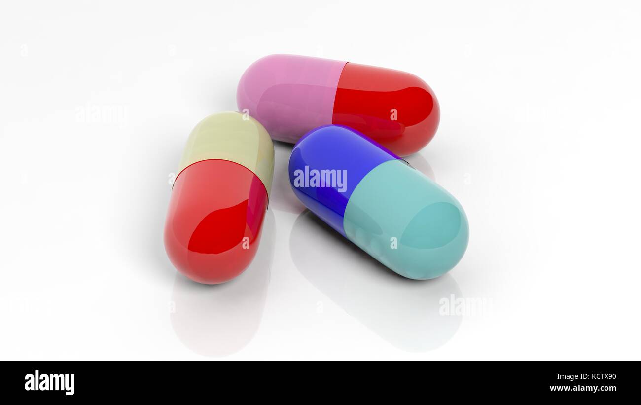 Colorful caplets, isolated on white background Stock Photo - Alamy