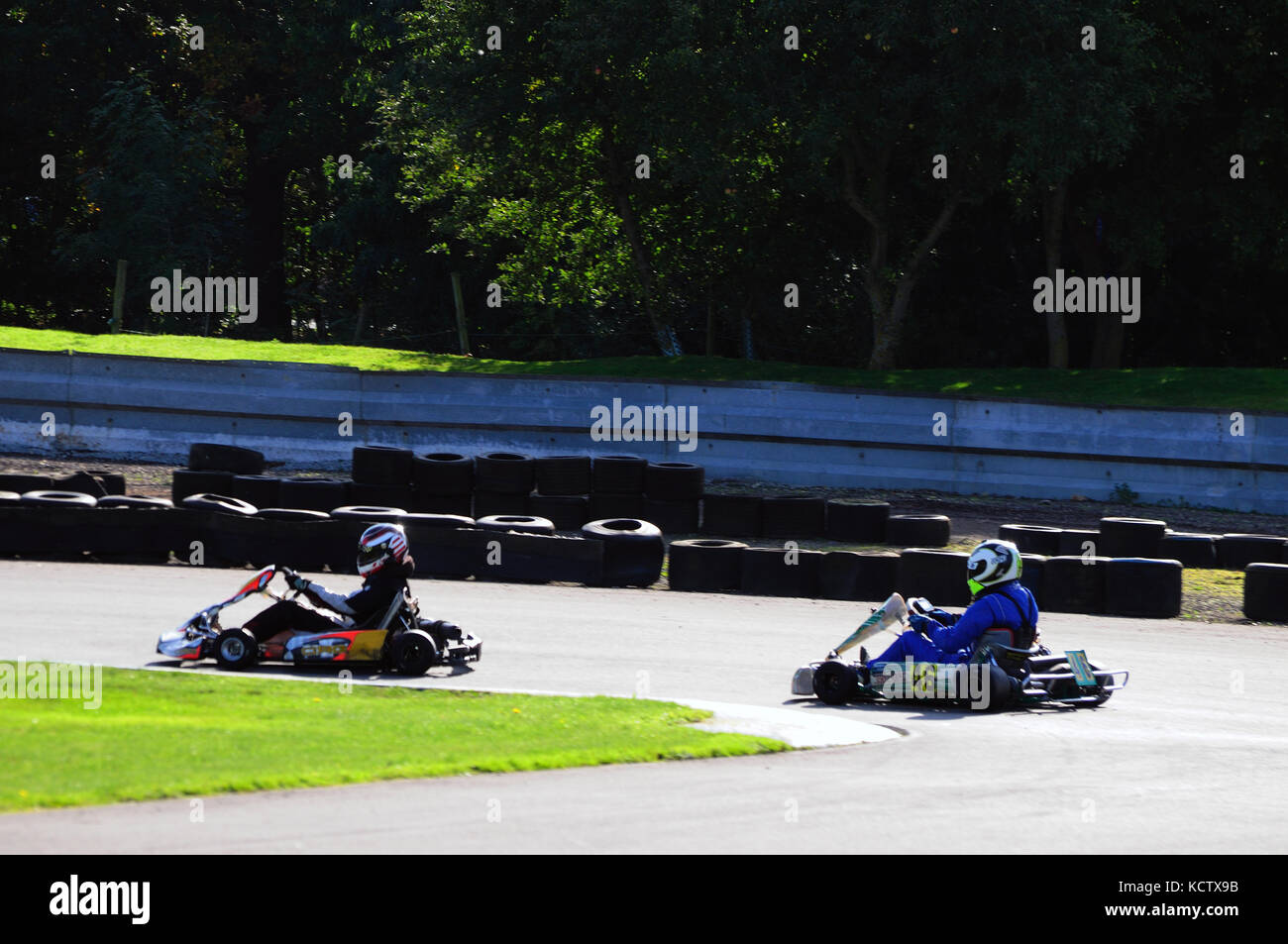 Go Karting around a track Stock Photo - Alamy