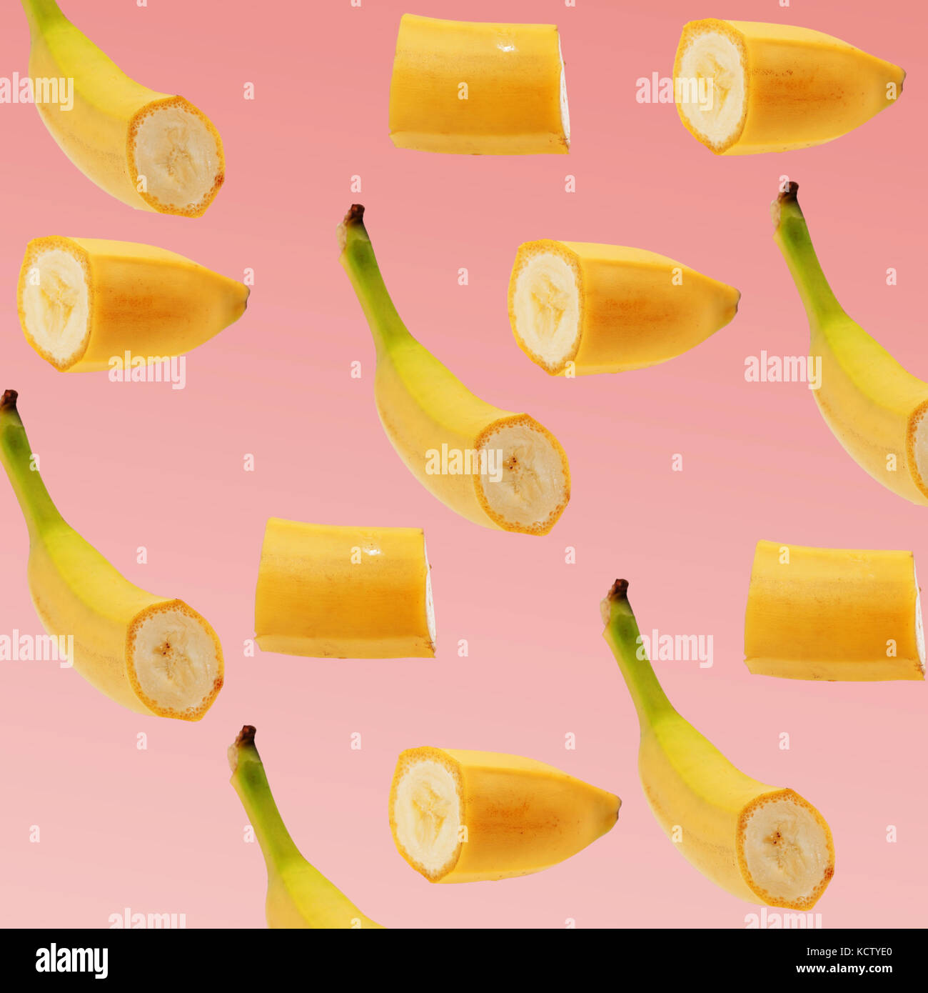 Banana slice pattern on pastel pink background. Minimal fruit concept ...