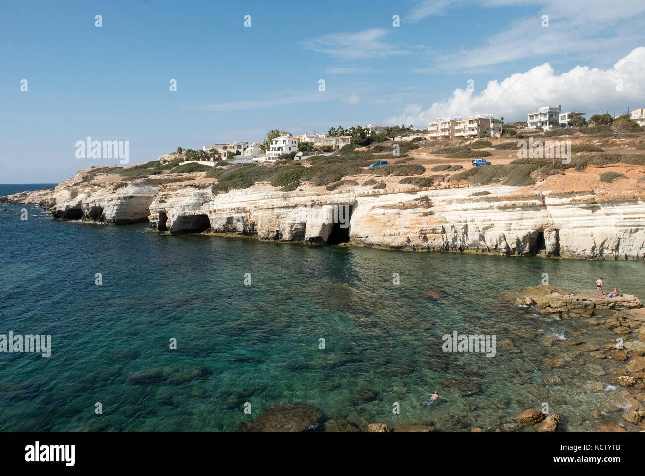 snorkelers and sun bathers at Sea Caves district, Peyia, Paphos, Cyprus ...