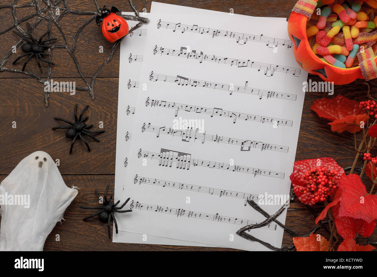 Top view of decorations Happy Halloween Festival and music notes paper ...