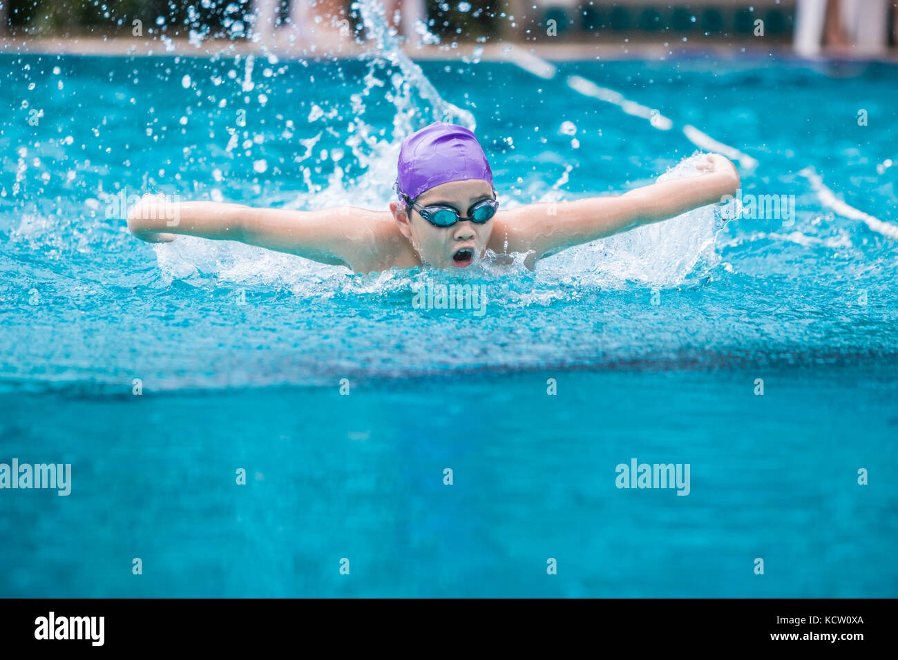 Chiang Mai, Thailand - 5 October 2017 - boy swimmer swim furiously in ...