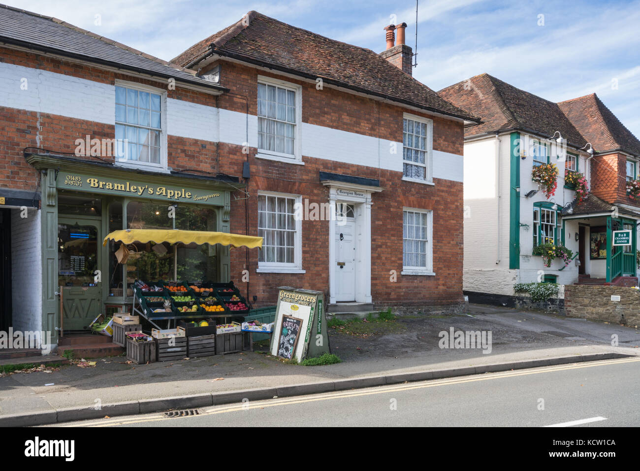 View of the high street in the village of Bramley, Surrey, UK, with the ...