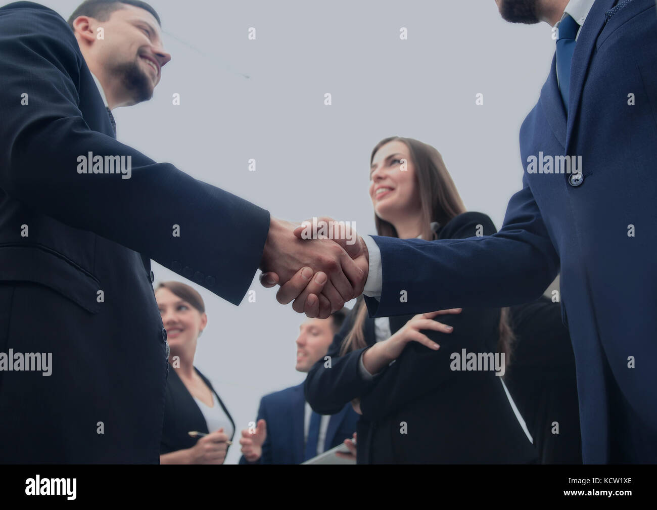 Large group of multiethnic business people making handshake Stock Photo ...