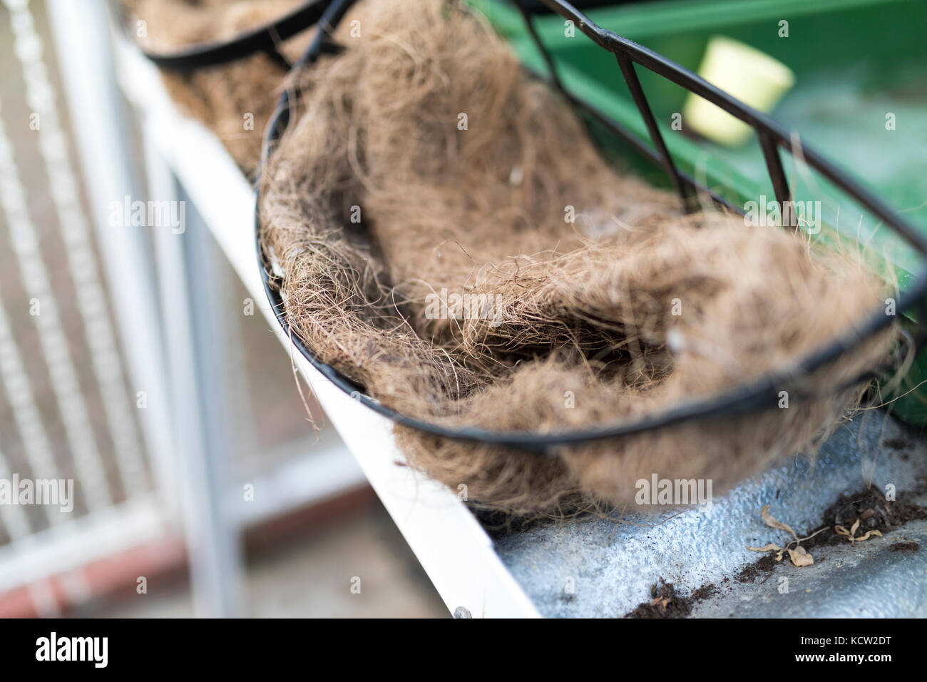Wrought iron hanging basket hi-res stock photography and images - Alamy
