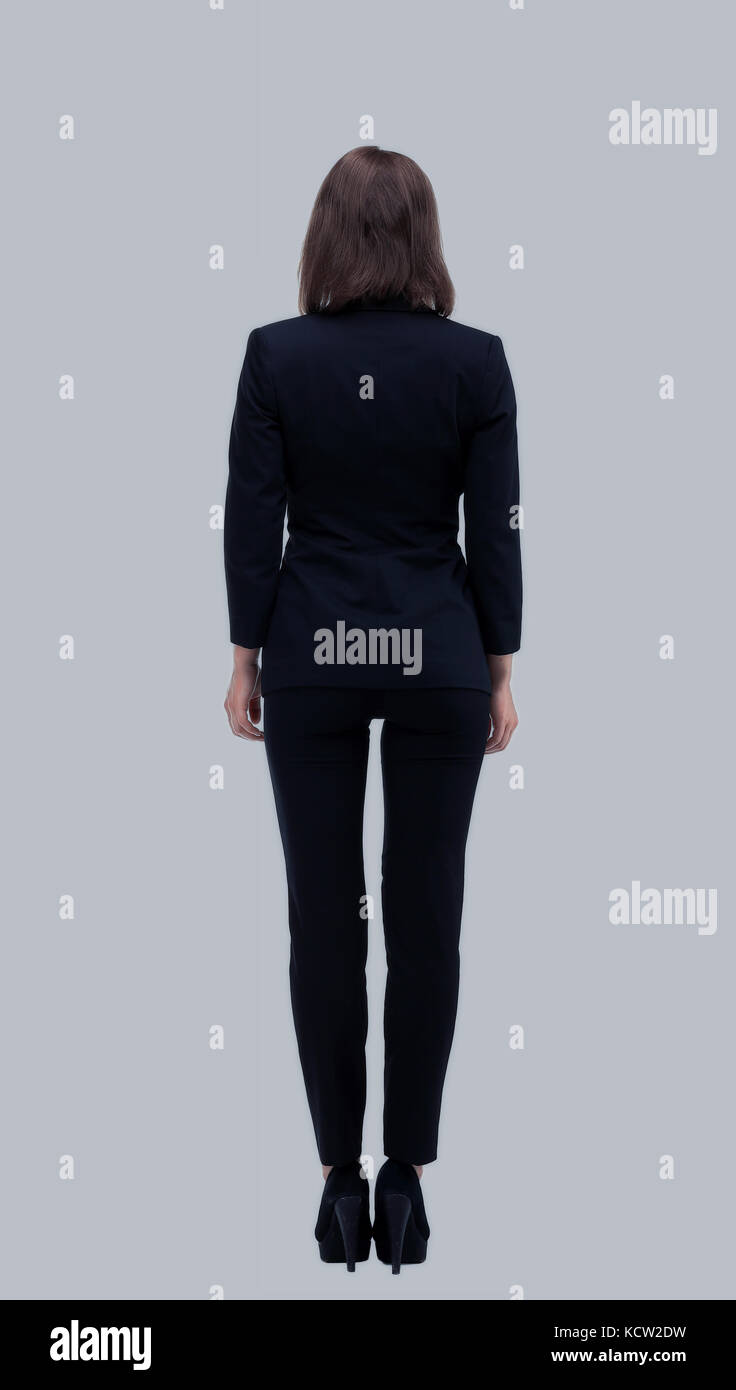 Business woman stand back side with white wall background Stock Photo ...