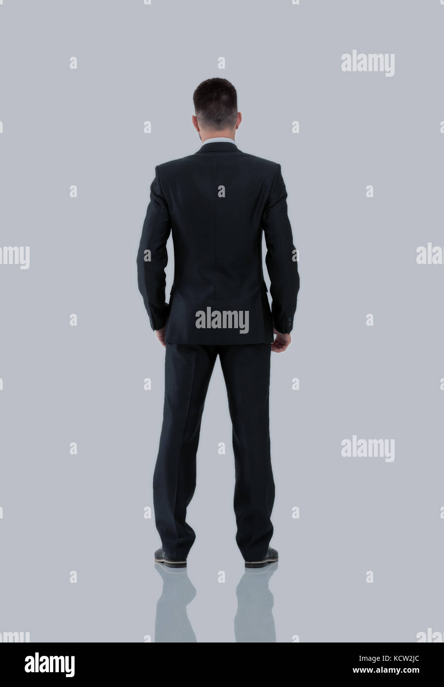 Business man looking at something isolated on white background Stock ...