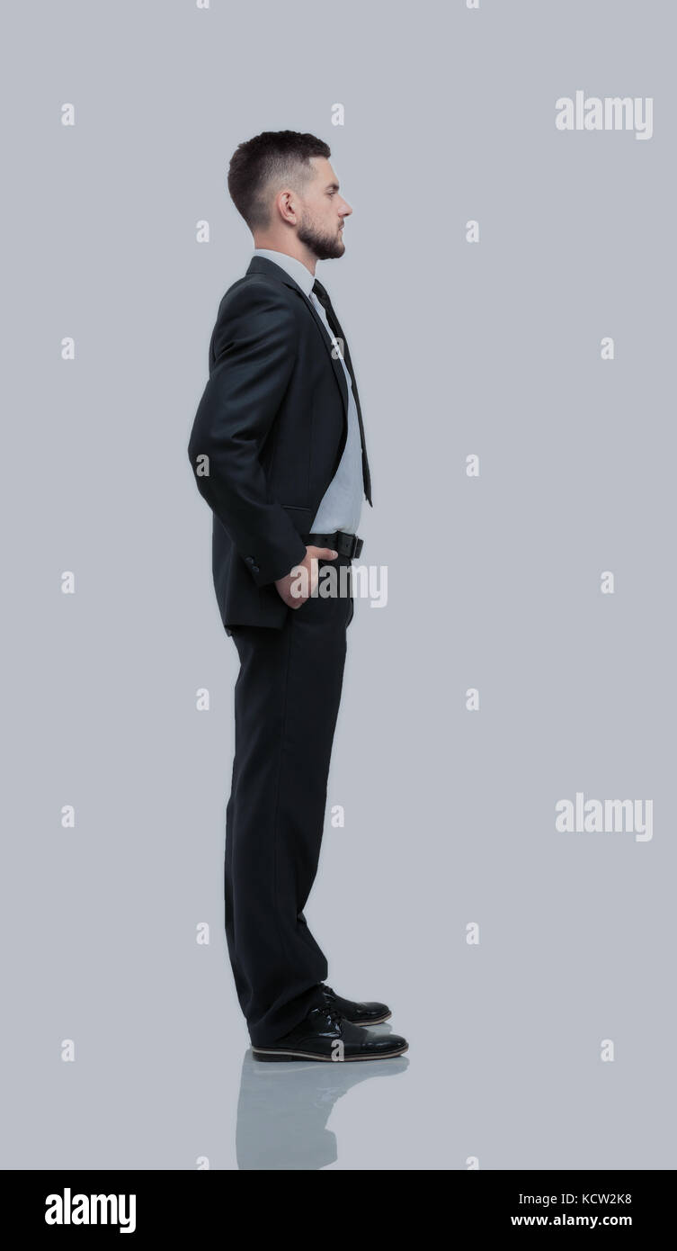 Portrait of the young smiling turned businessman isolated on a white ...