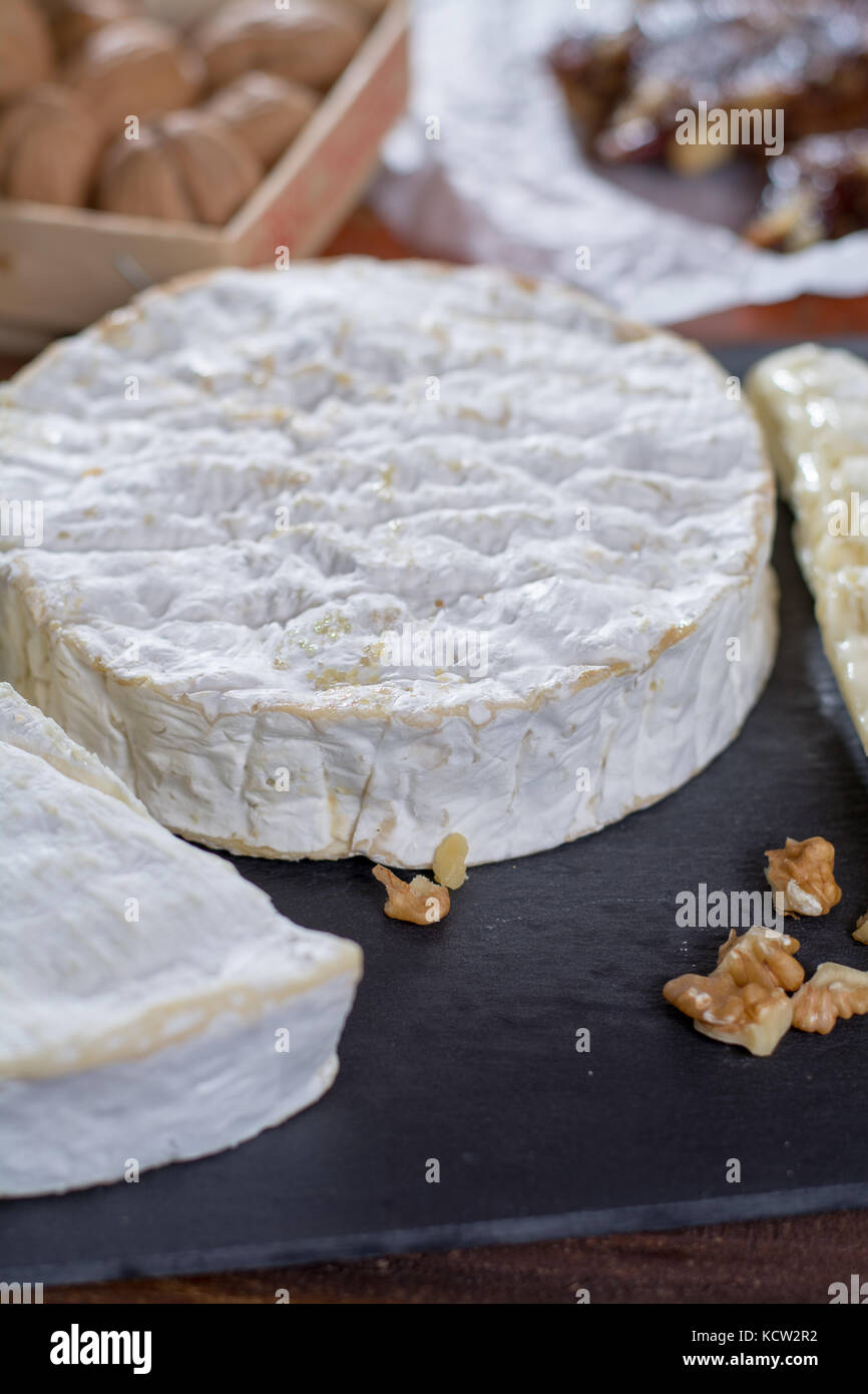 Variety of French soft cheeses - camembert, marcaire, munster, brie ...