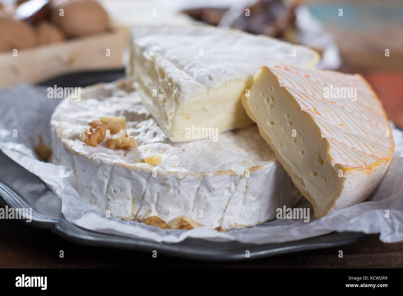 Variety of French soft cheeses - camembert, marcaire, munster, brie ...