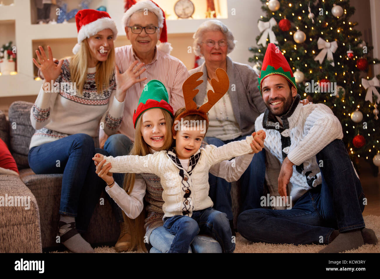 Portrait of happy smiling family in Christmas hats Stock Photo - Alamy