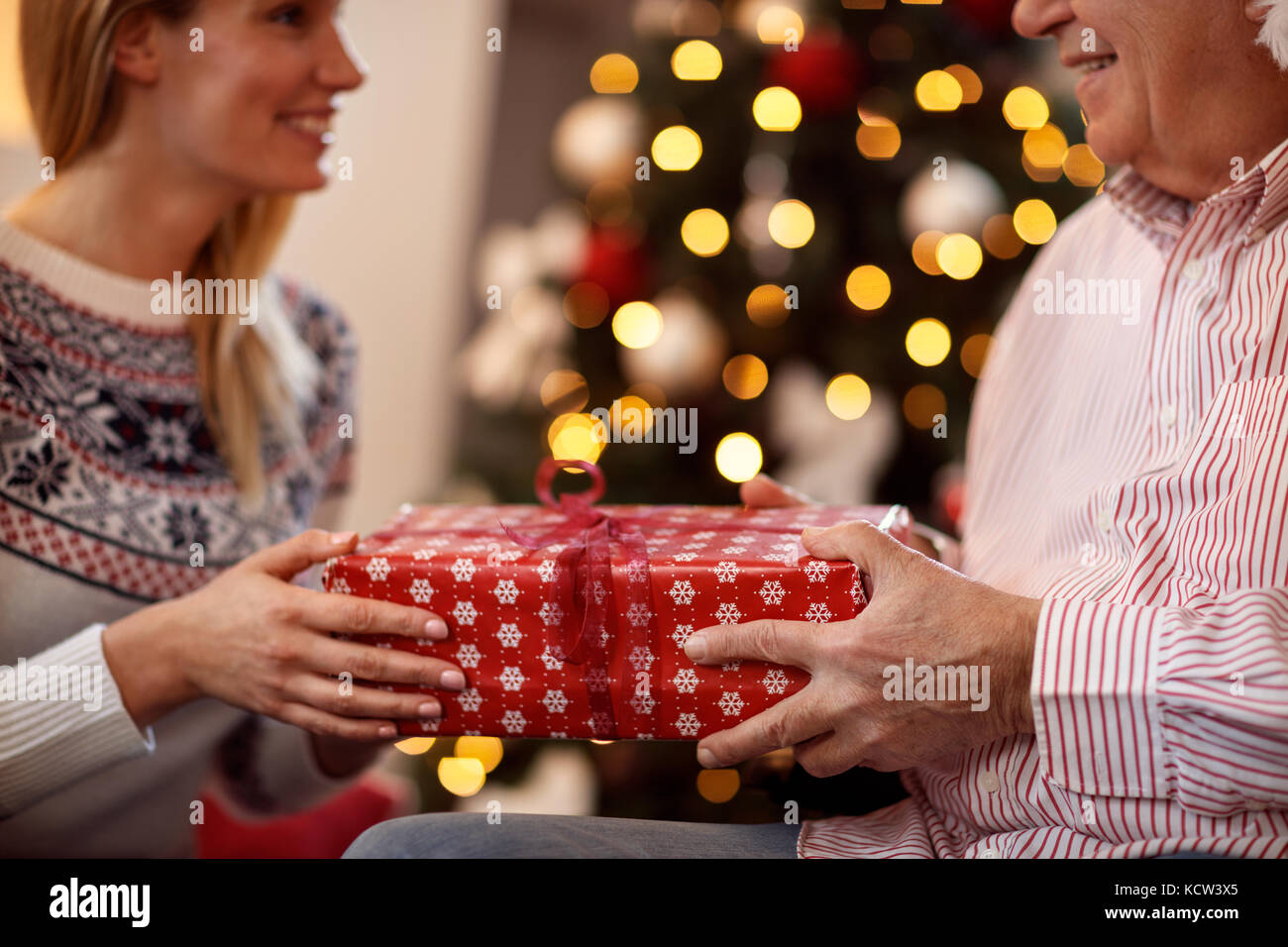 Exchanging Christmas Gifts close up Stock Photo - Alamy