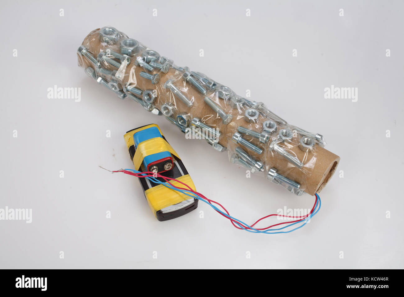 Pipe Bomb with cell phone firing device Stock Photo - Alamy
