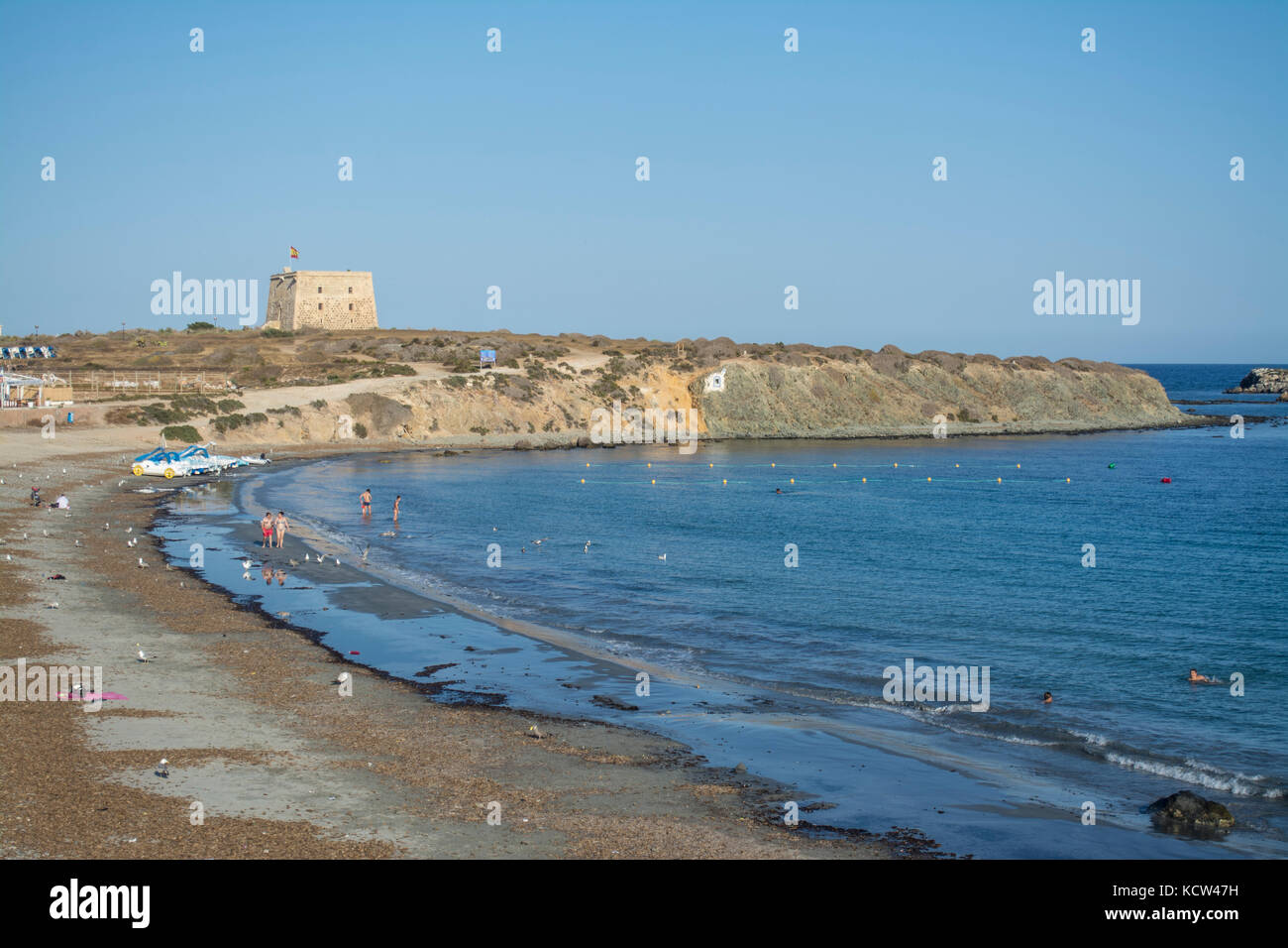 Mediterranean sea laps on the beach at the Spanish Island of Tabarca ...