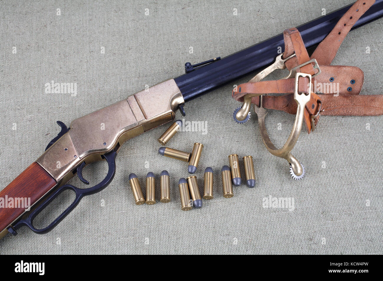 Wild west rifle and ammunition Stock Photo - Alamy
